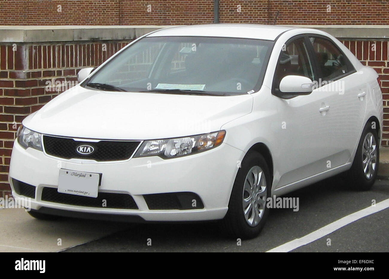 The 2010 Kia Forte EX is a compact sedan that offers a stylish design ...