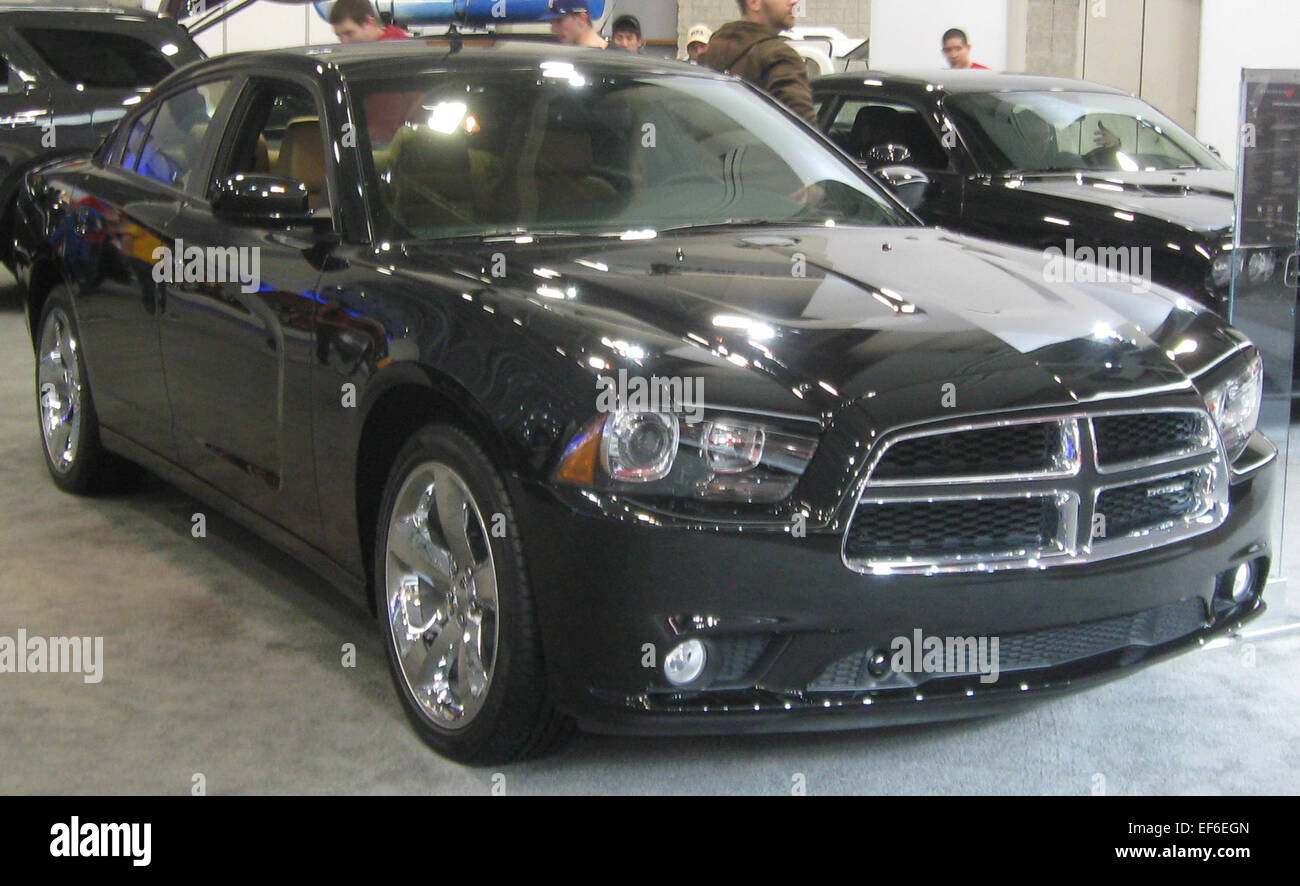 The 2011 Dodge Charger Rallye Plus is a full-size sedan with bold ...