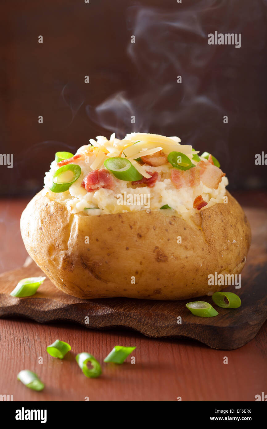 baked potato in jacket with bacon and cheese Stock Photo - Alamy