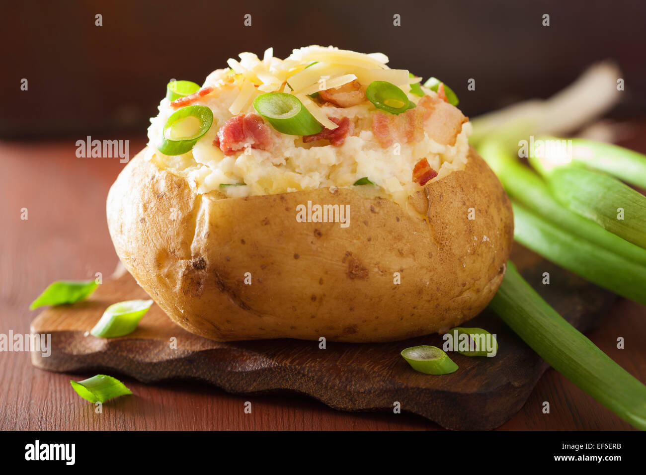baked potato in jacket with bacon and cheese Stock Photo - Alamy