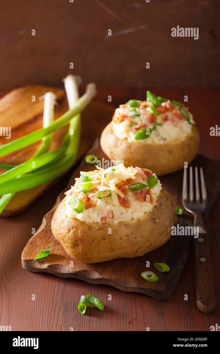 baked potato in jacket with bacon and cheese Stock Photo - Alamy