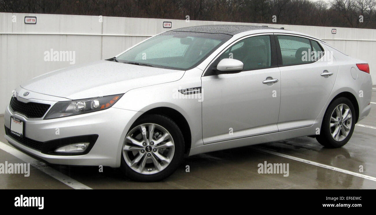 The 2011 Kia Optima EX features a sleek exterior design and a ...