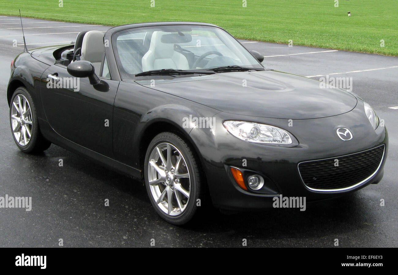 The 2011 Mazda MX-5 PRHT is a lightweight sports car equipped with a ...