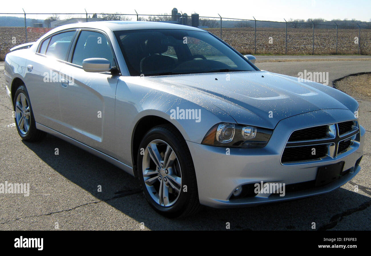 The 2012 Dodge Charger SXT is a full-size sedan featuring a 3.6-liter ...