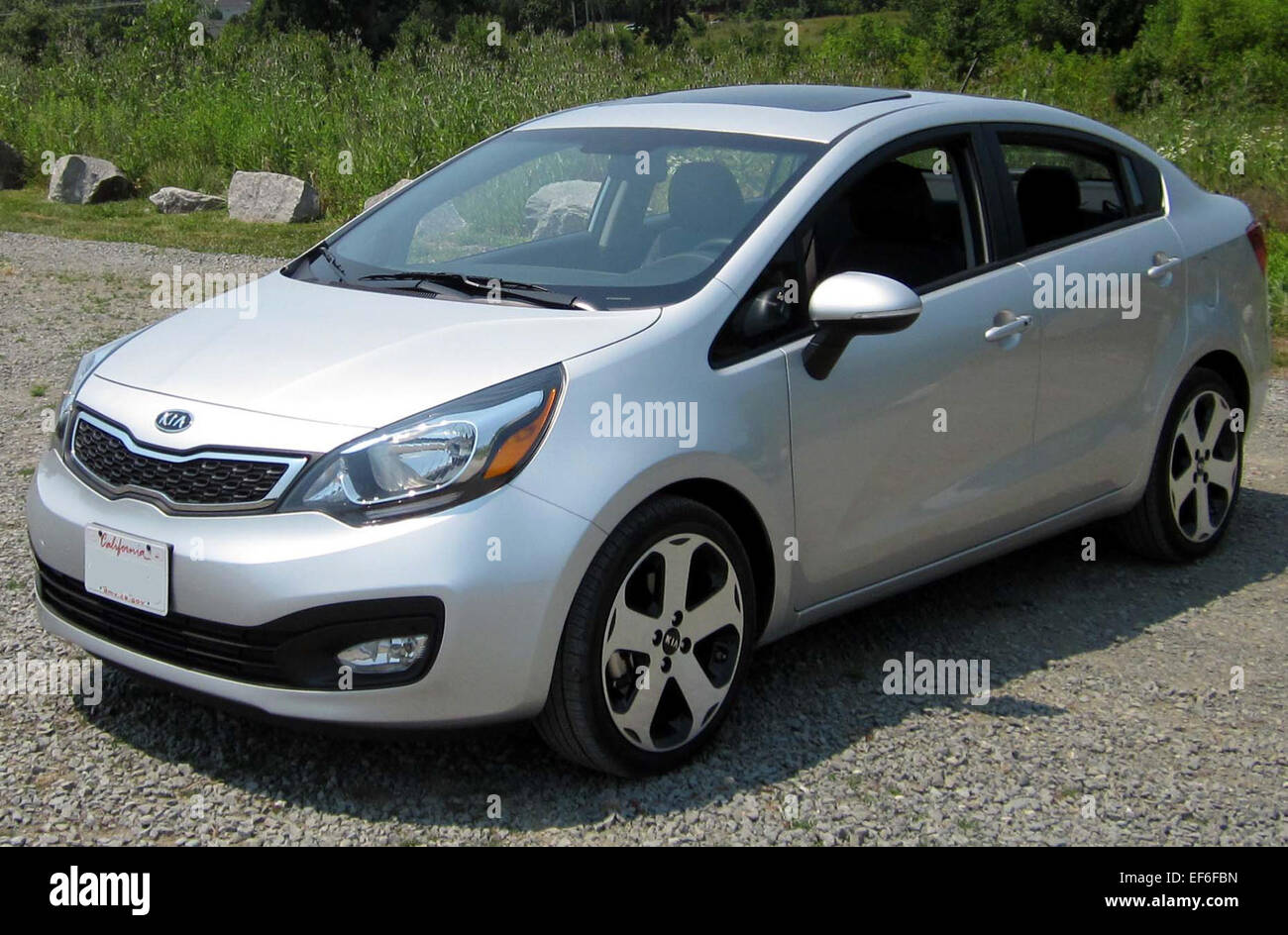 The 2012 Kia Rio SX sedan offers a compact design with sporty styling ...