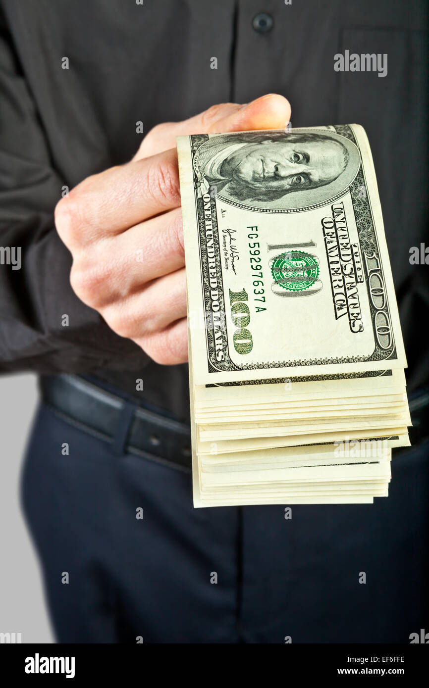 Money and hand hi-res stock photography and images - Alamy