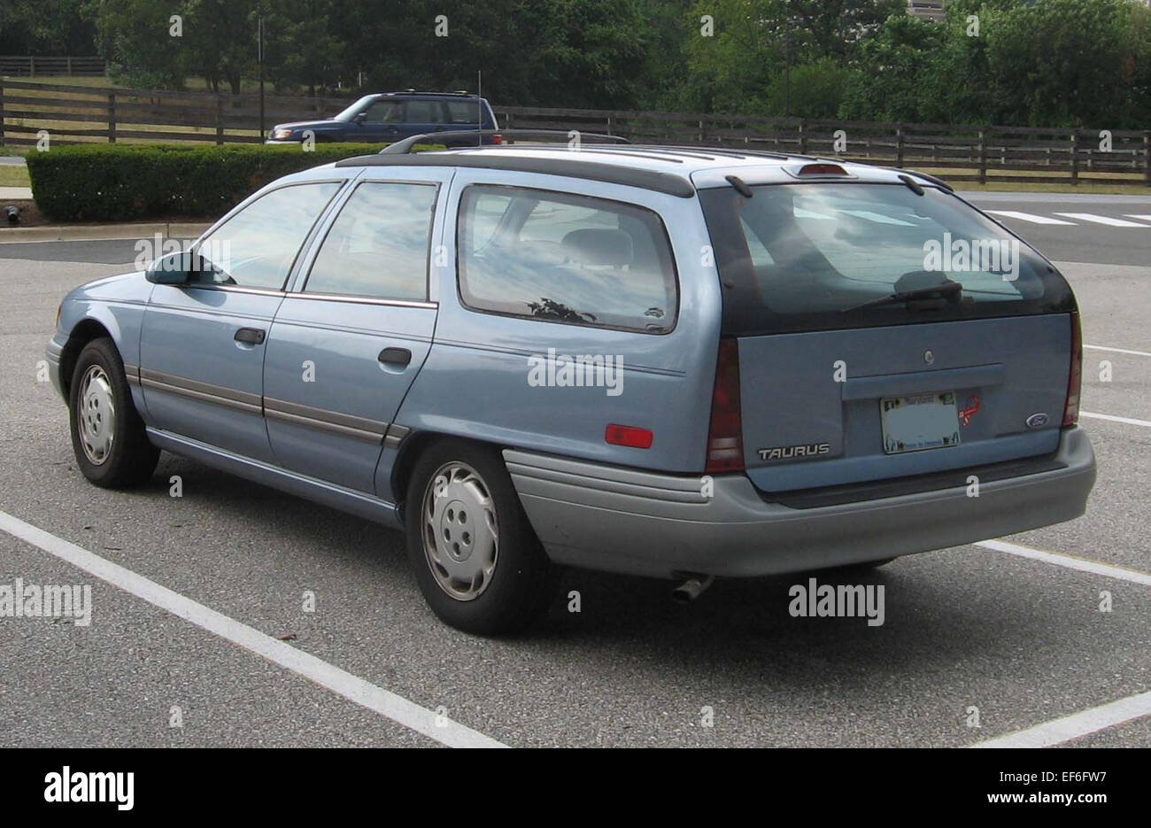 The 2nd-generation Ford Taurus GL wagon is a mid-size family car that ...