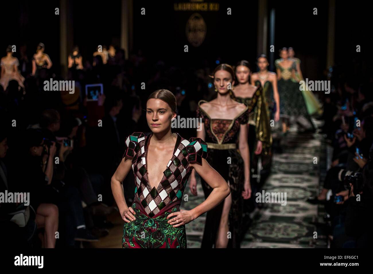 Paris, France. 27th Jan, 2015. Models present creations by Laurence Xu ...
