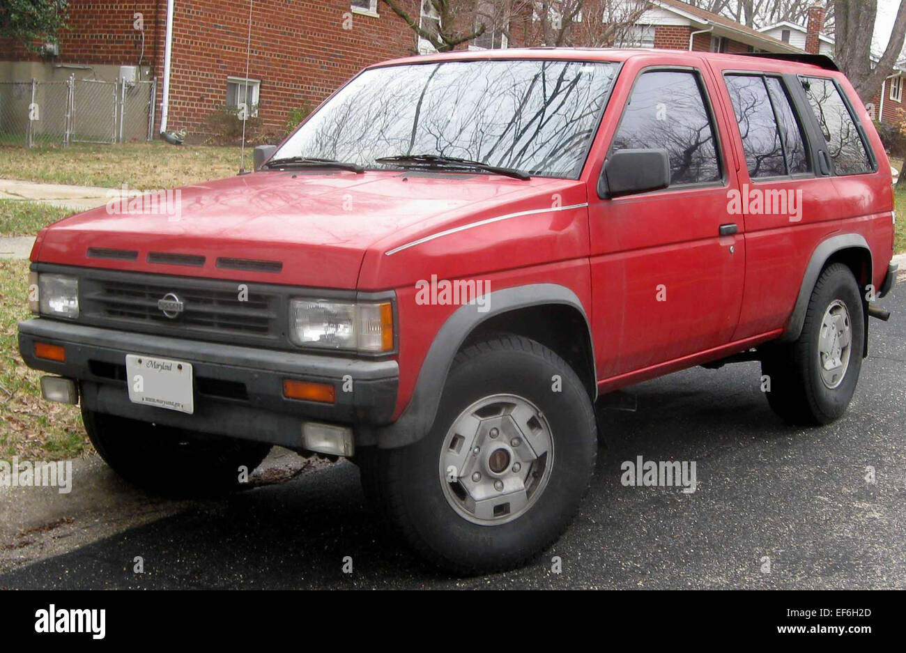 The 1990-1992 Nissan Pathfinder is a mid-size SUV that offers off-road ...