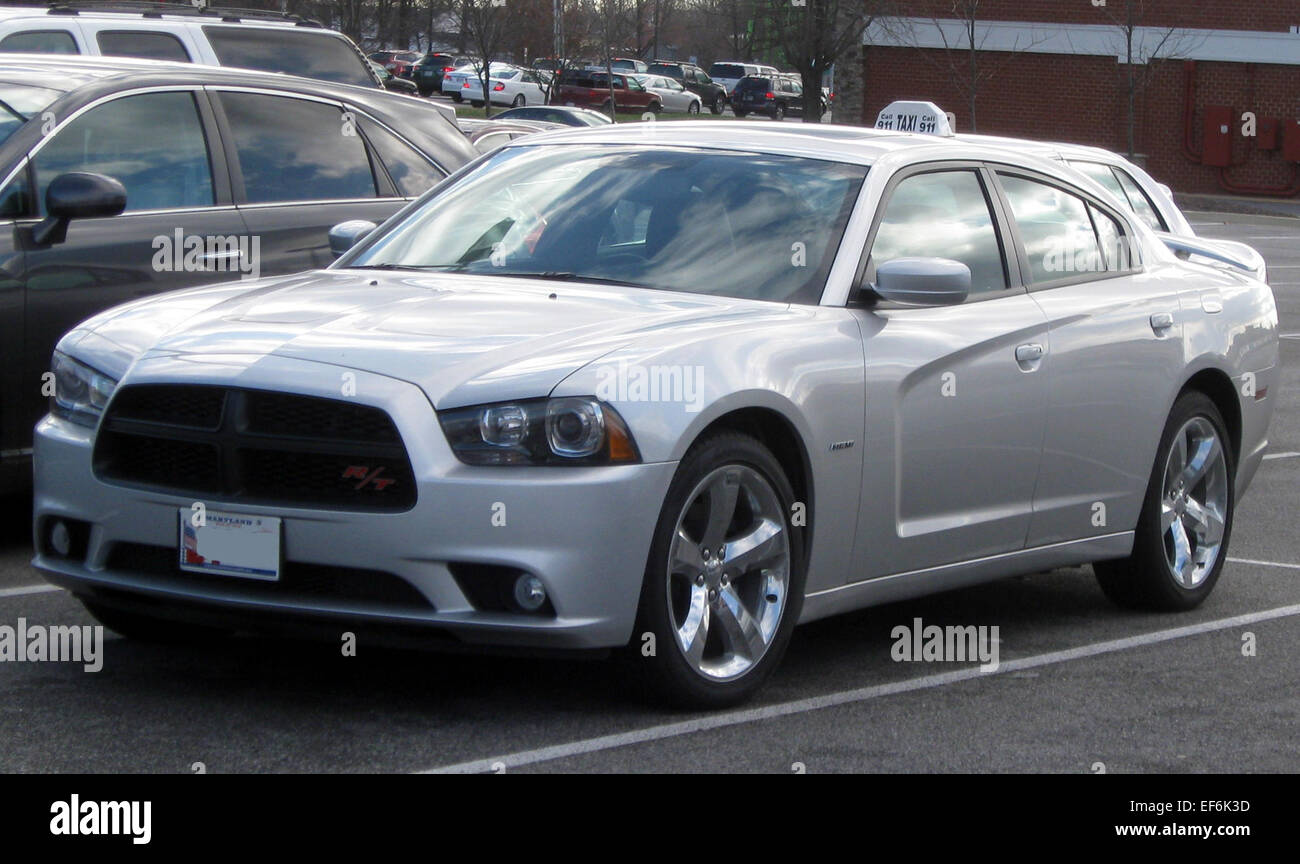 The 2011 Dodge Charger is a full-size sedan with a bold design and ...