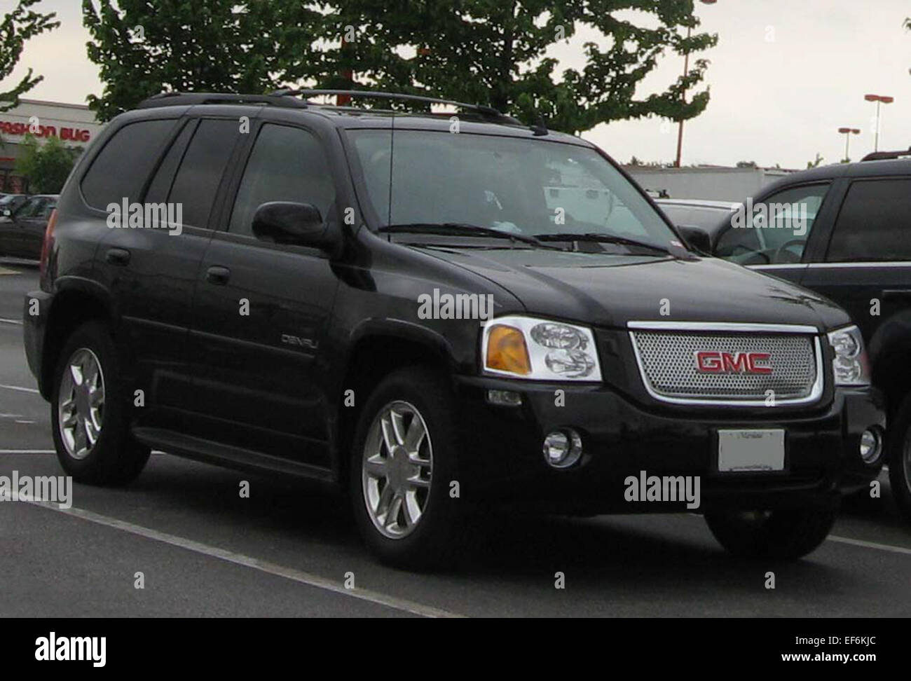 The GMC Envoy Denali is a full-size SUV that offers a premium driving ...