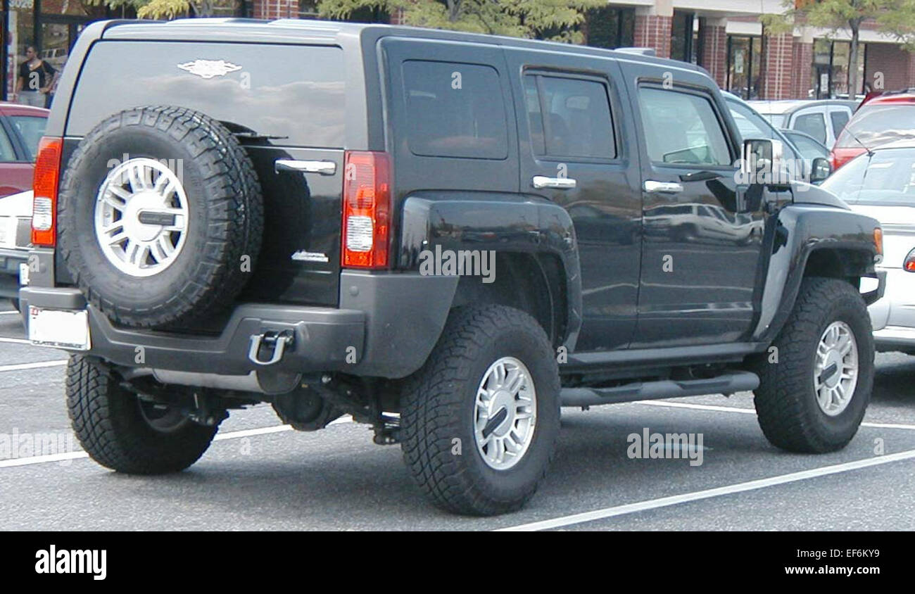 The Hummer H3 rear view showcases the rugged design and off-road ...