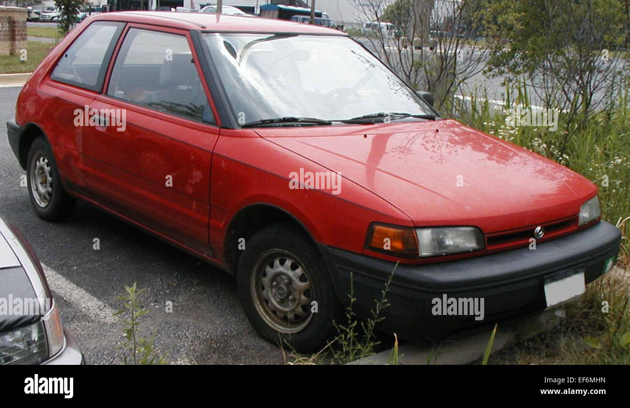 Mazda 323 hatch 1 Stock Photo - Alamy