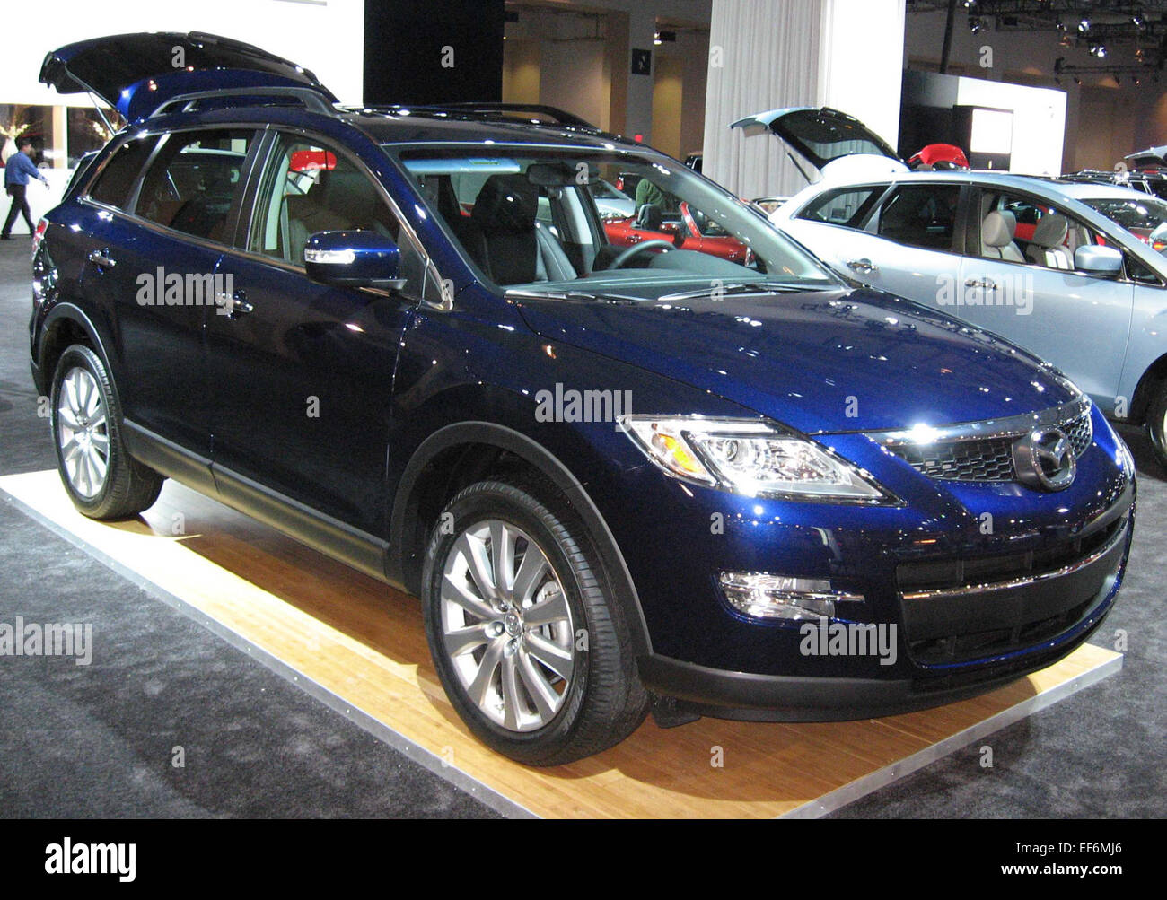 The Mazda CX-9 DC is a mid-size crossover SUV known for its stylish ...