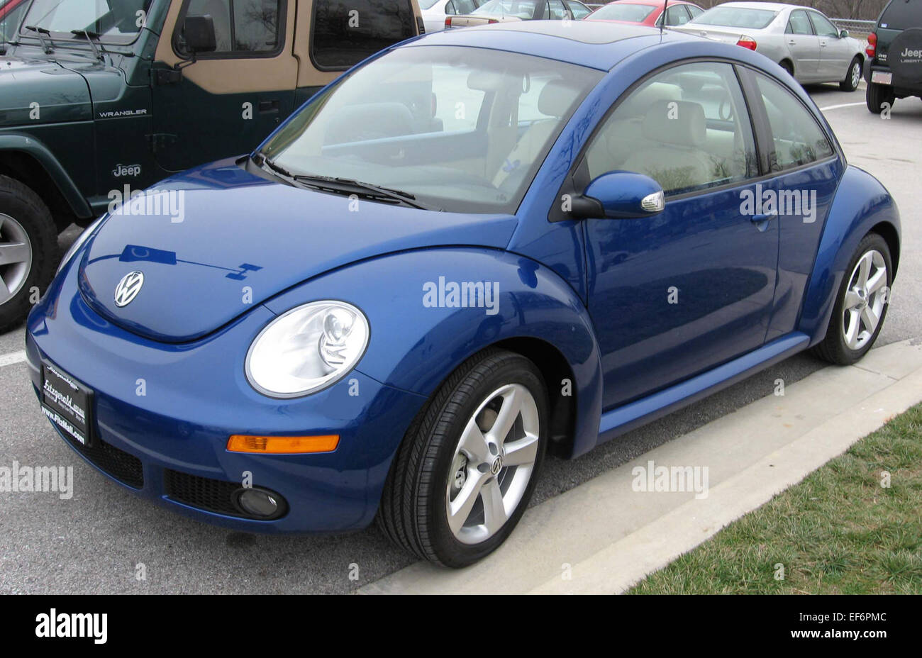 The Volkswagen New Beetle, produced from 1997 to 2010, is a compact car ...