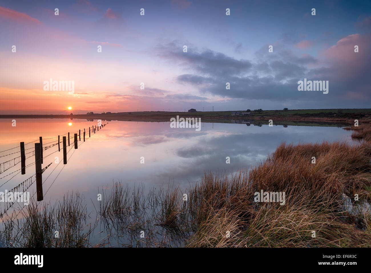 Beautiful sunset over Dozmary Pool the only natural lake on Bodmin Moor ...