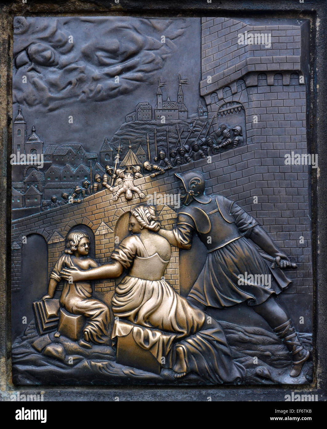 Plaque on the statue of John of Nepomuk has been polished to a shine by ...