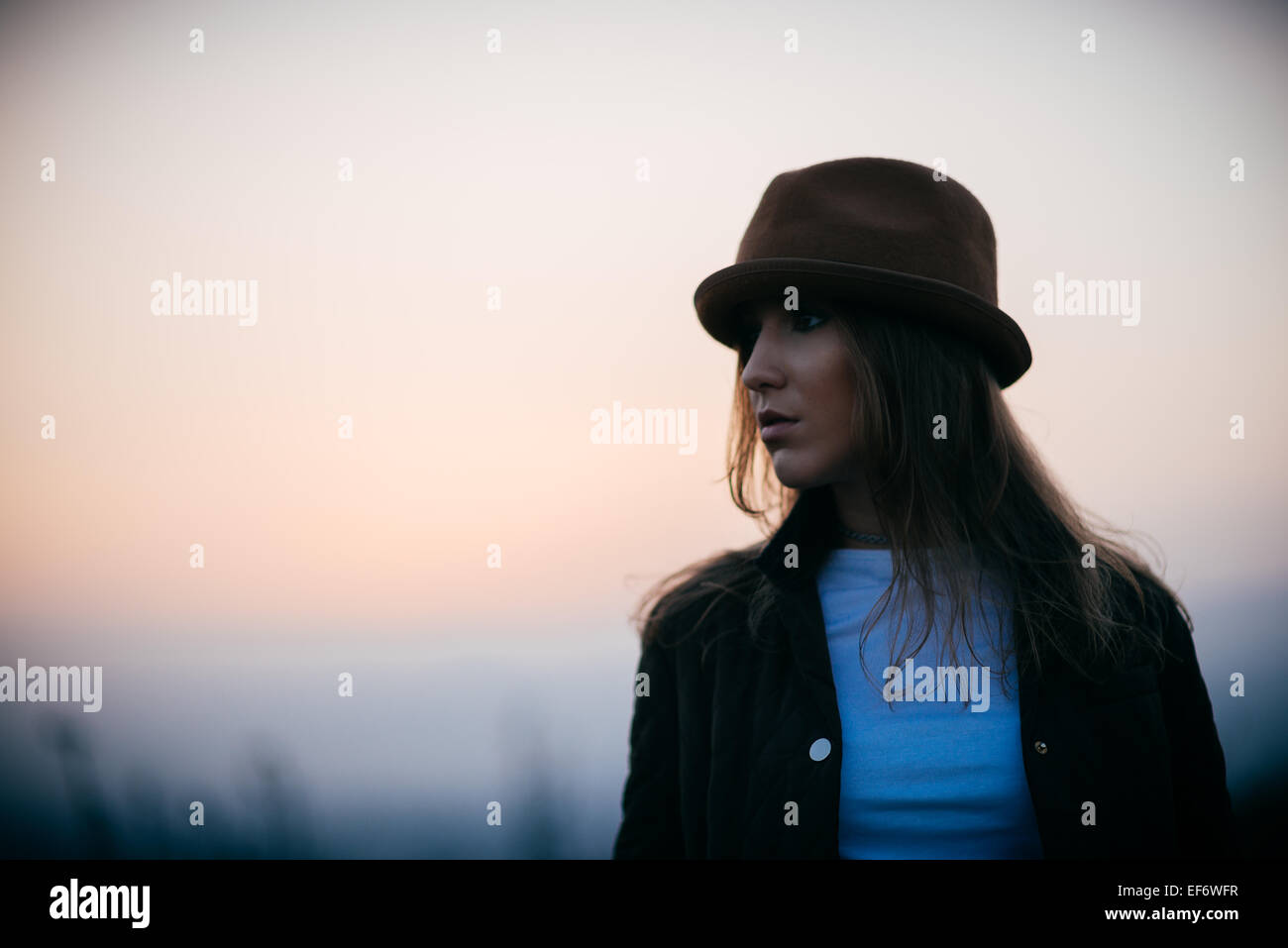 Brunette girl in late autumn walking outdoors Stock Photo - Alamy