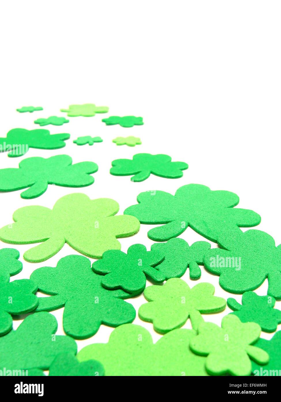 St Patricks Day shamrock confetti border or background Stock Photo - Alamy