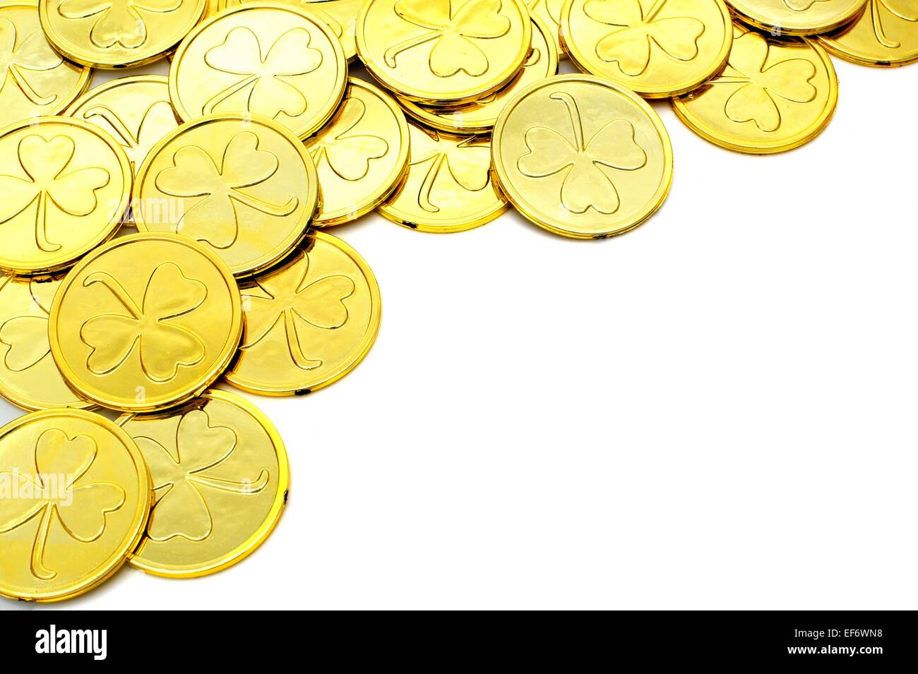 St Patricks Day gold coin corner border over a white background Stock ...