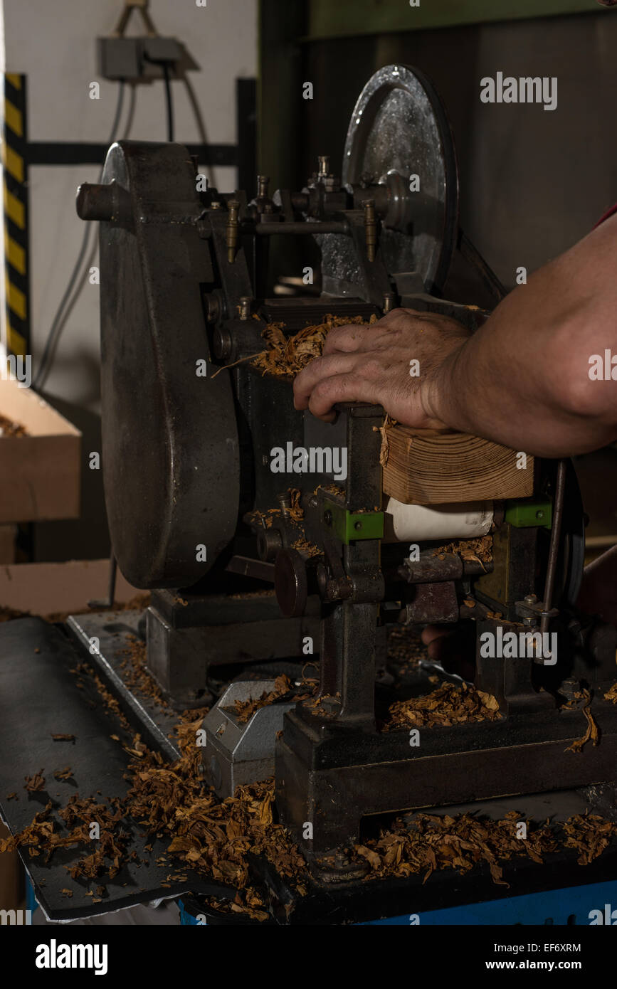 Tobacco cutting machine hi-res stock photography and images - Alamy