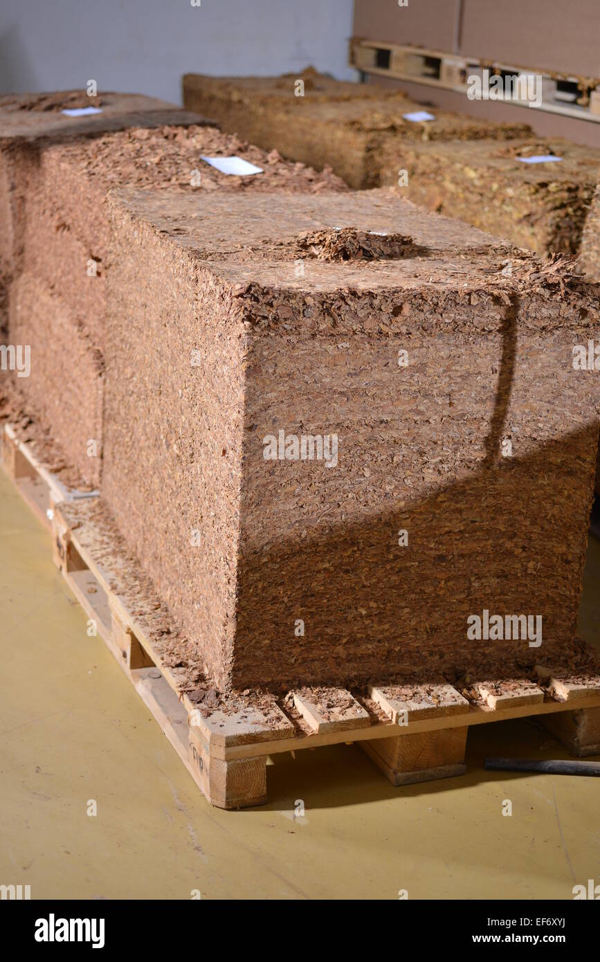 Bulk tobacco palettes inside a cigarette factory warehouse Stock Photo ...