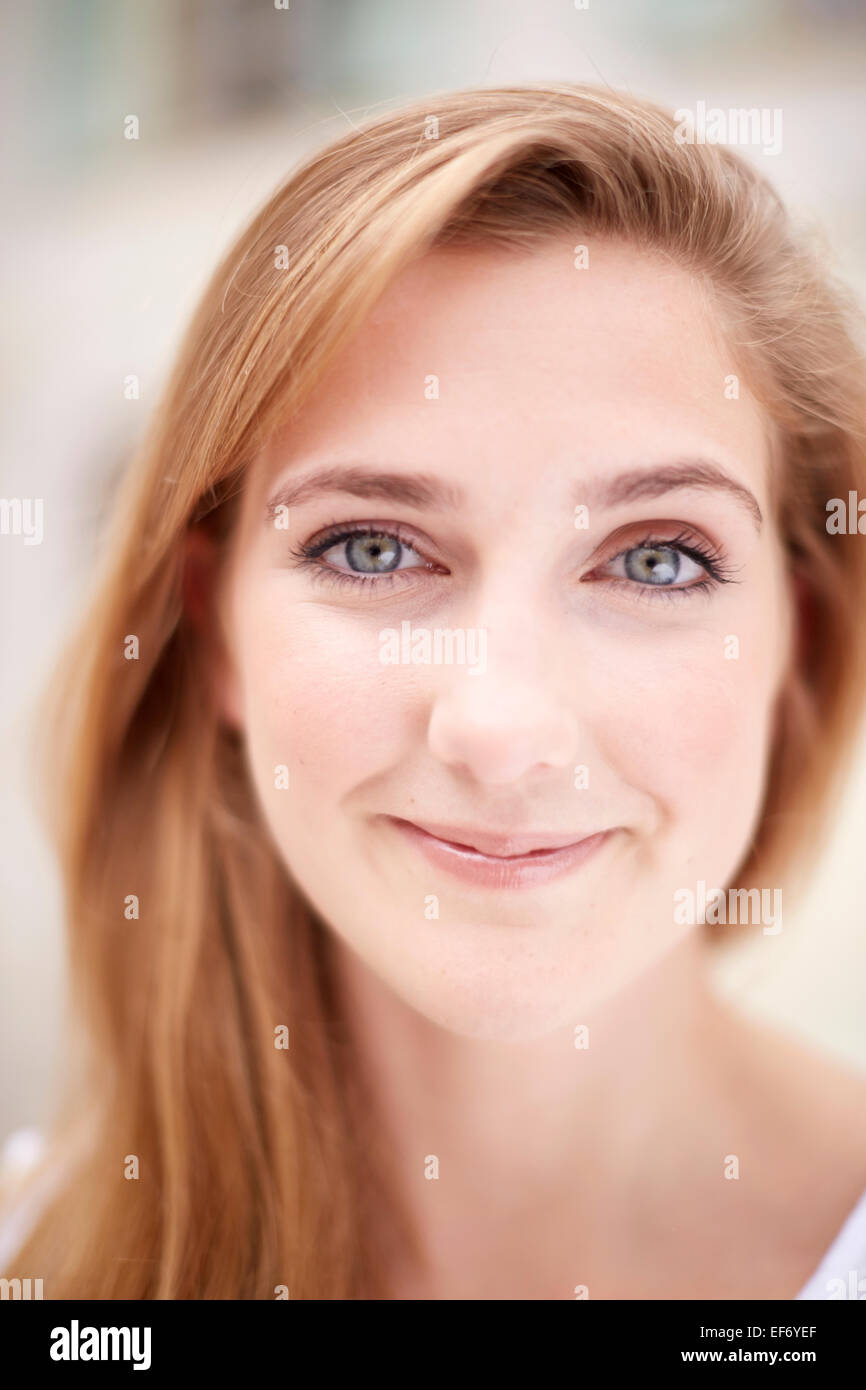 Straight faced young woman blonde hi-res stock photography and images ...