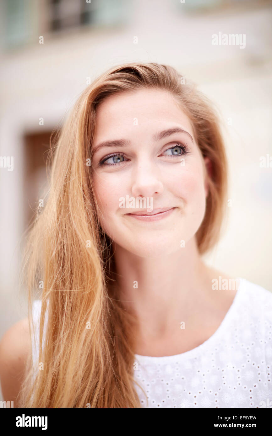 Straight faced young woman blonde hi-res stock photography and images ...