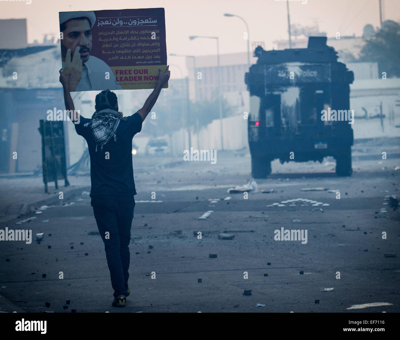 A protester carries a portrait of Sheikh Ali Salman as Bahraini ...