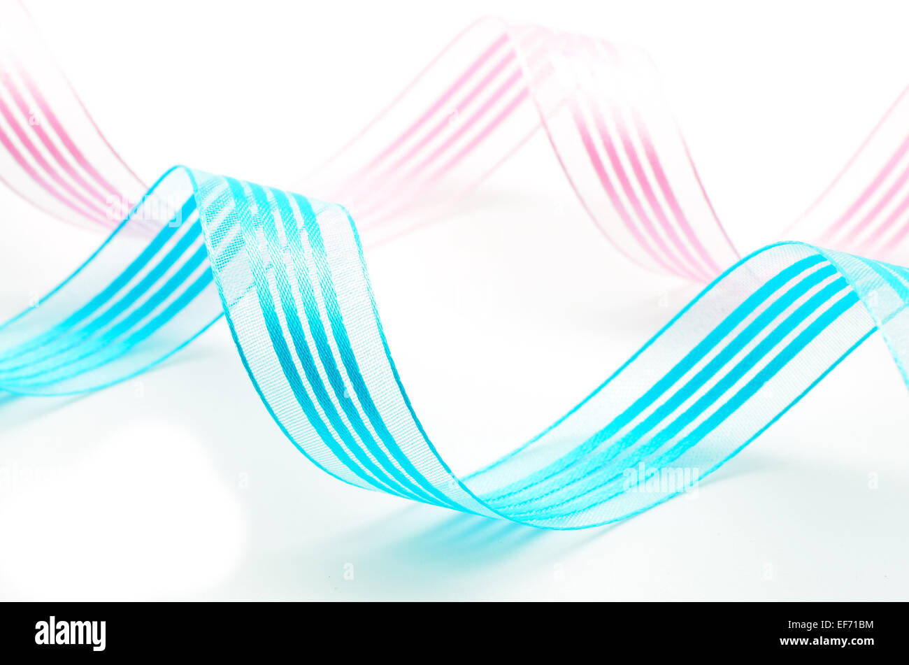 Blue and pink ribbon, isolated on a white background Stock Photo - Alamy