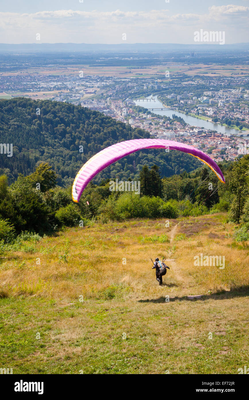 Paraglider running for take off Stock Photo - Alamy