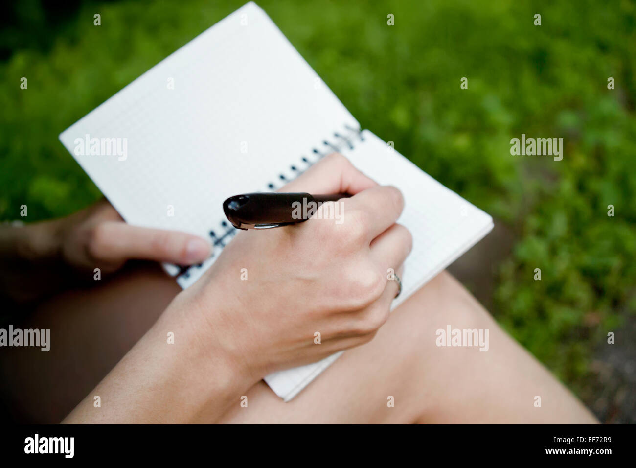 Female Hand Writing Stock Photo - Alamy