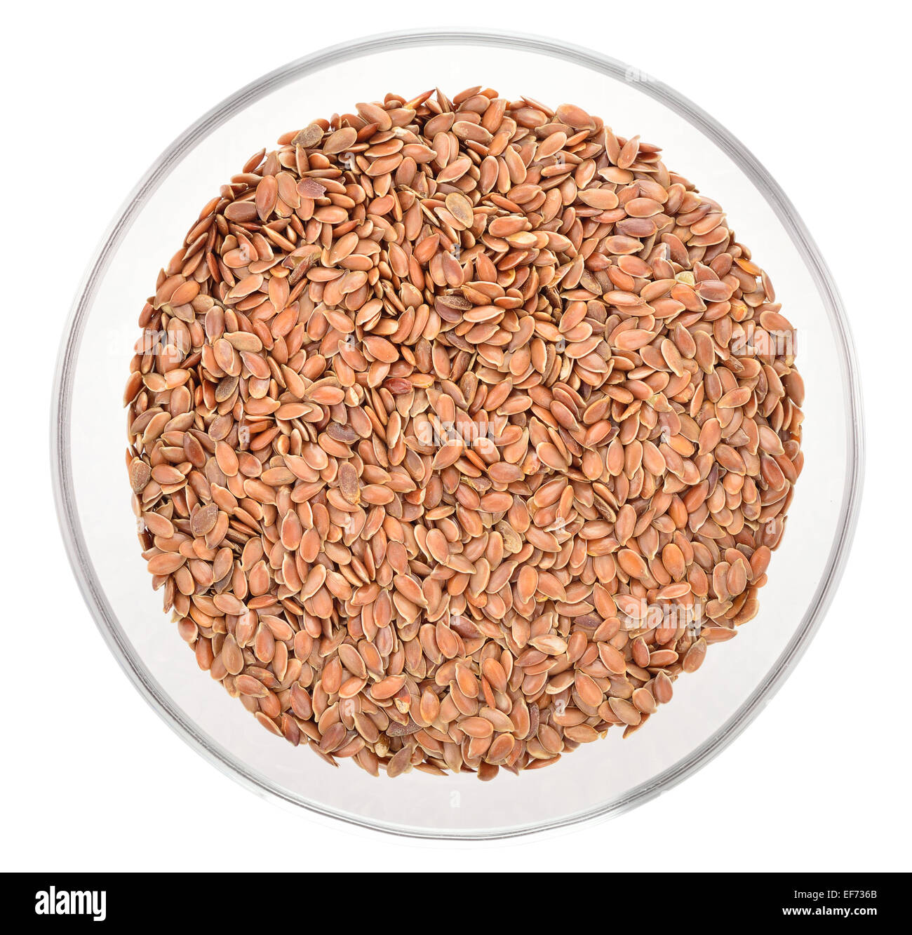 Brown flax seeds in glass bowl isolated on white background. Flax seeds ...