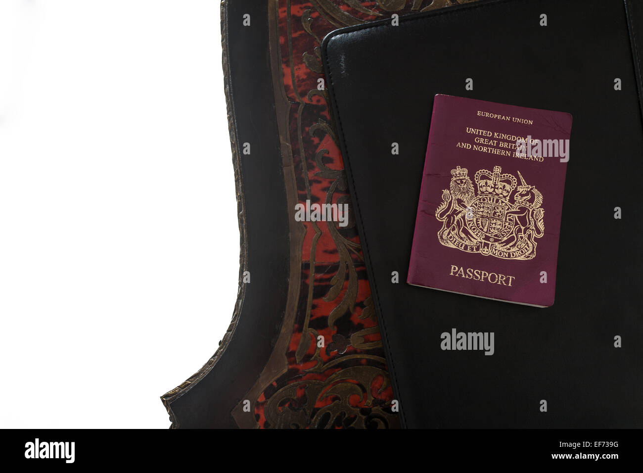 A United Kingdom passport sitting on a Buhl table Stock Photo - Alamy