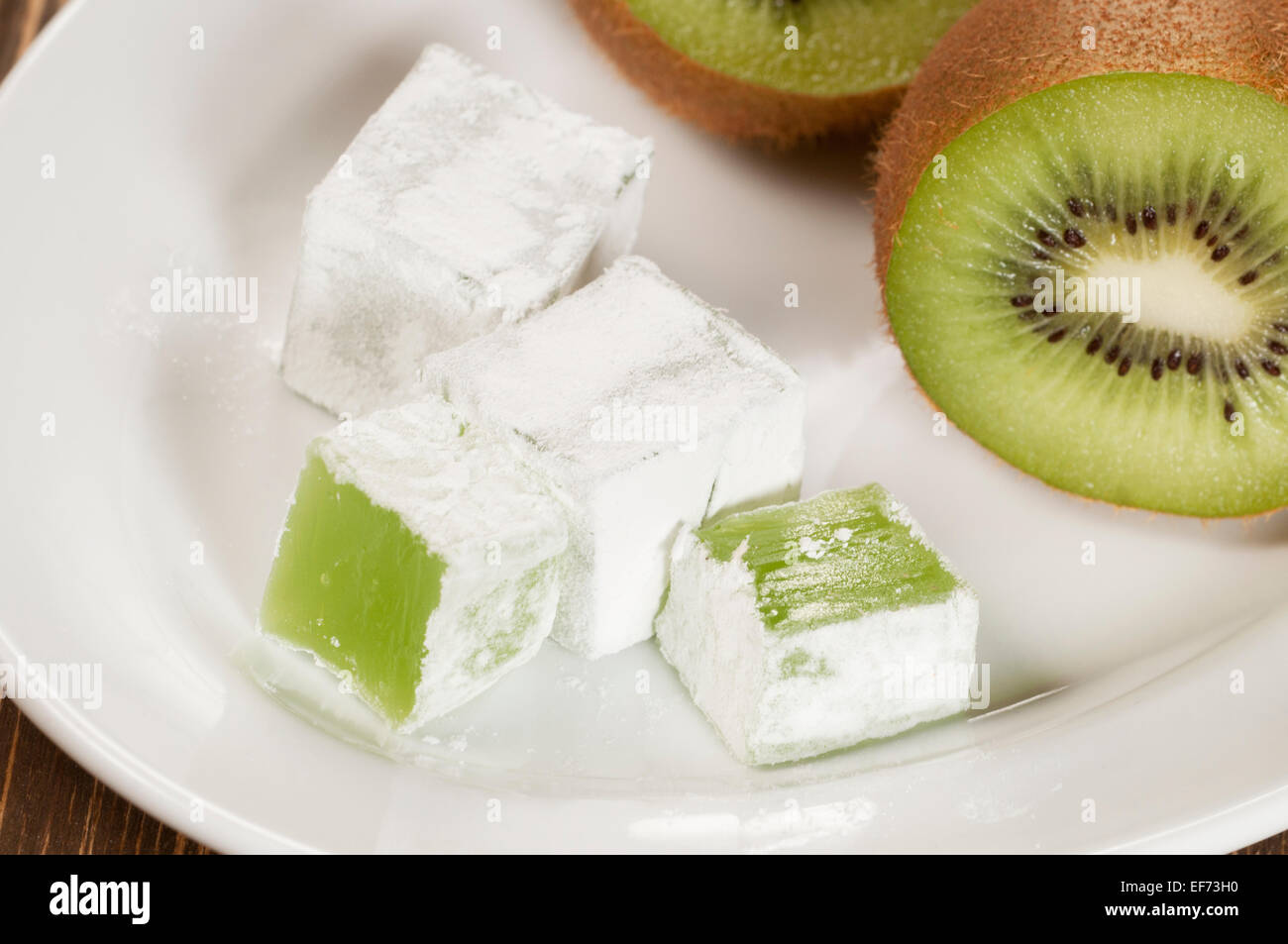 Lukum (Turkish Delight) with kiwi fruit, closeup shot, local focus ...