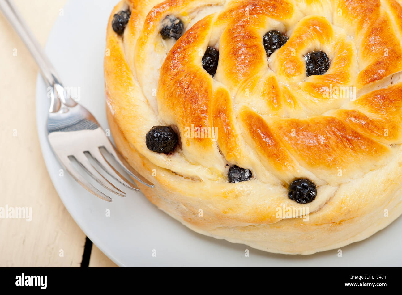 fresh home baked blueberry bread cake dessert over white wood table ...