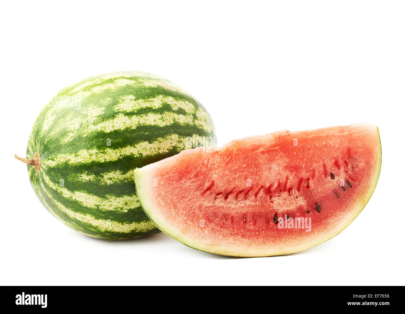 Composition of a whole watermelon fruit next to a slice, isolated over ...