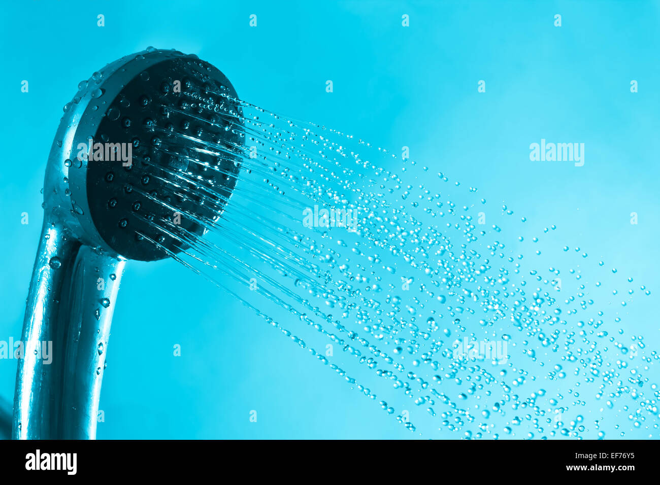 fresh splash bath shower and current blue water Stock Photo - Alamy