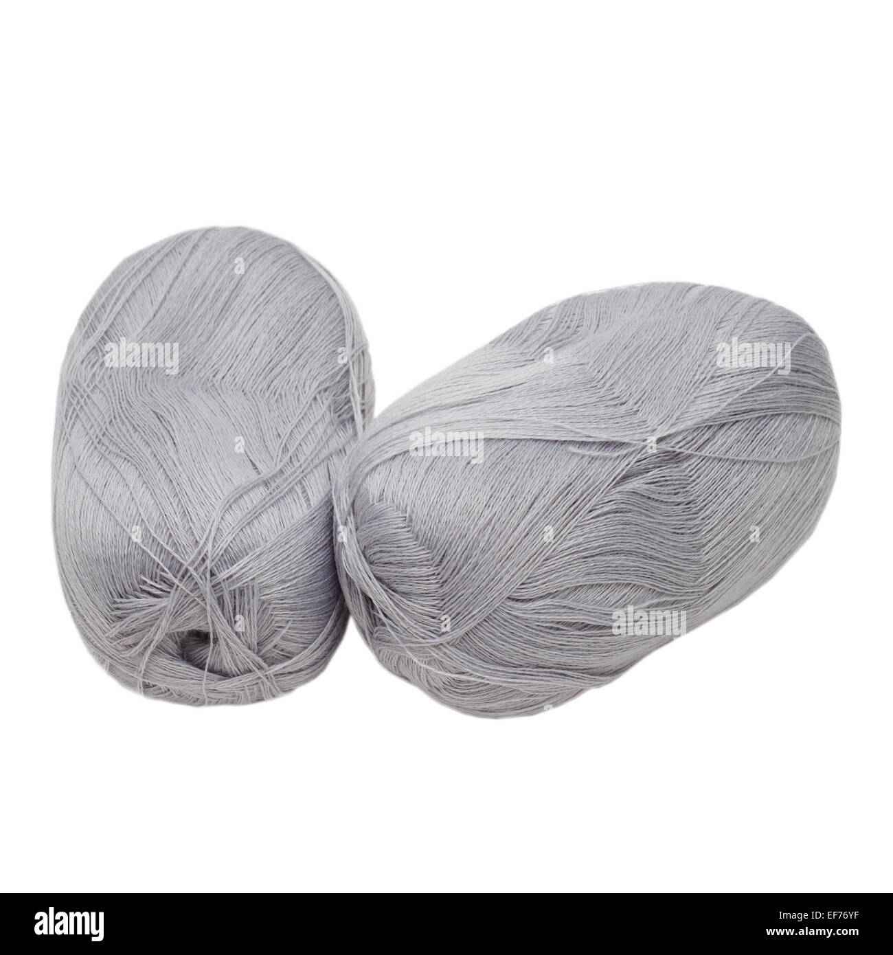 gray balls of yarn are isolated on a white background Stock Photo - Alamy