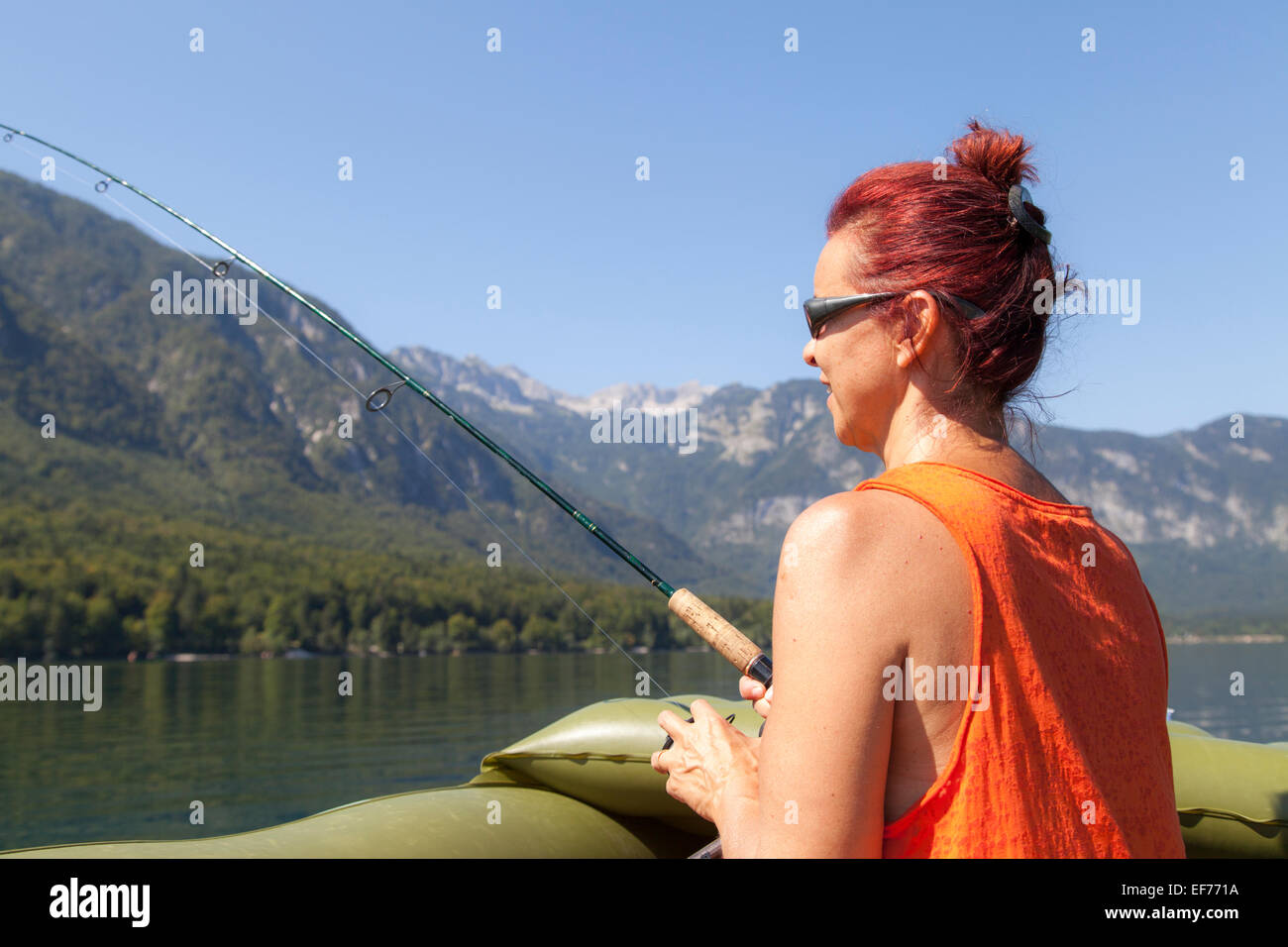 Green fisherwoman hi-res stock photography and images - Alamy