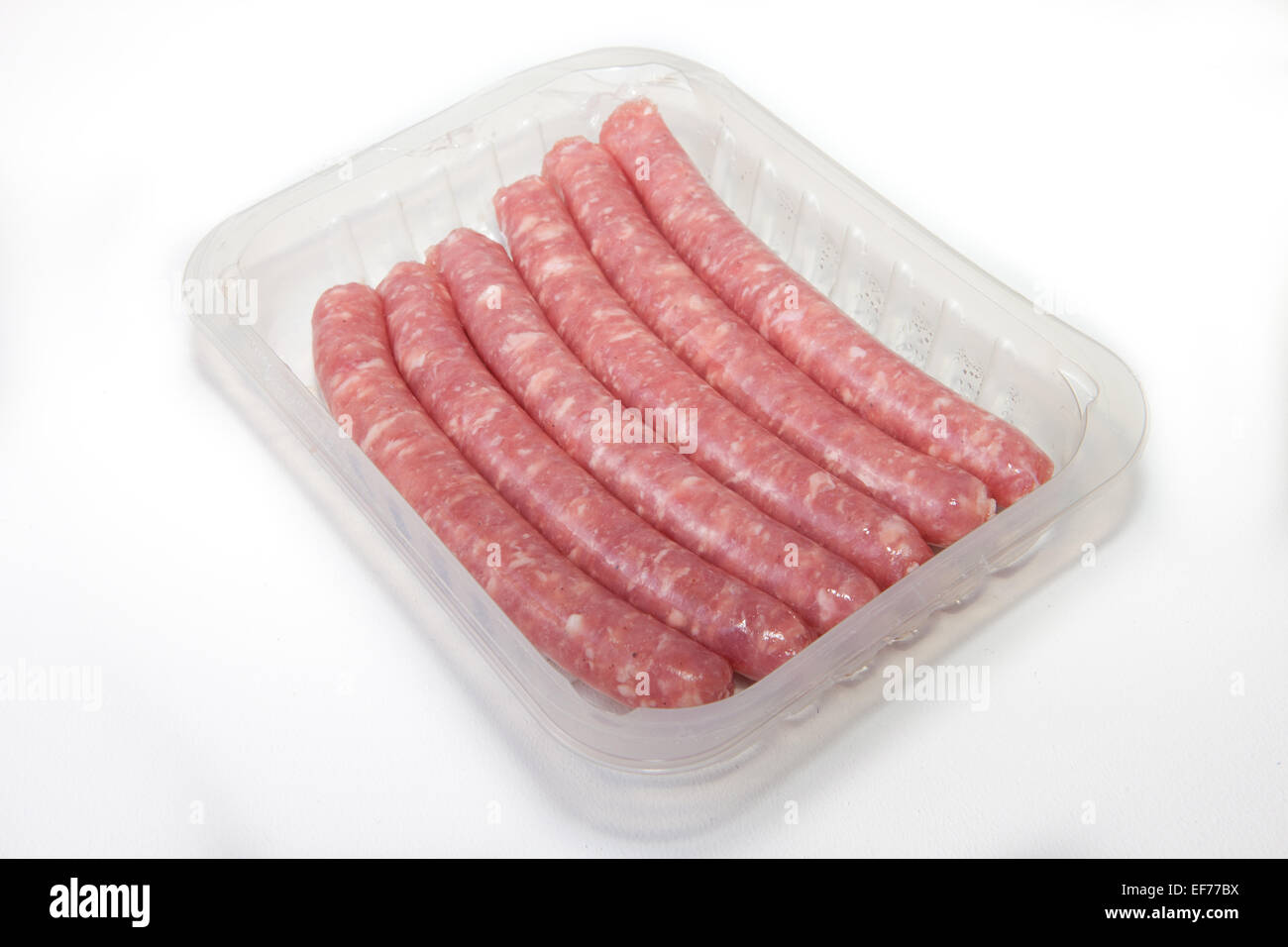 Spicy pork sausages on the package, isolated on white background Stock ...