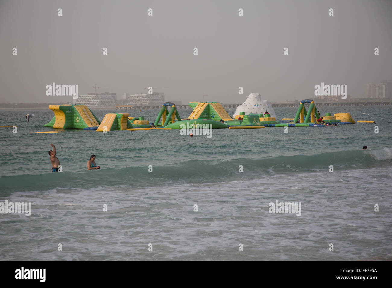 Inflatable playground in the sea at Jumeirah Beach Stock Photo - Alamy