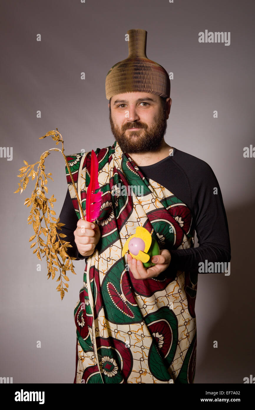 young casual silly man portrait in a dark background Stock Photo - Alamy