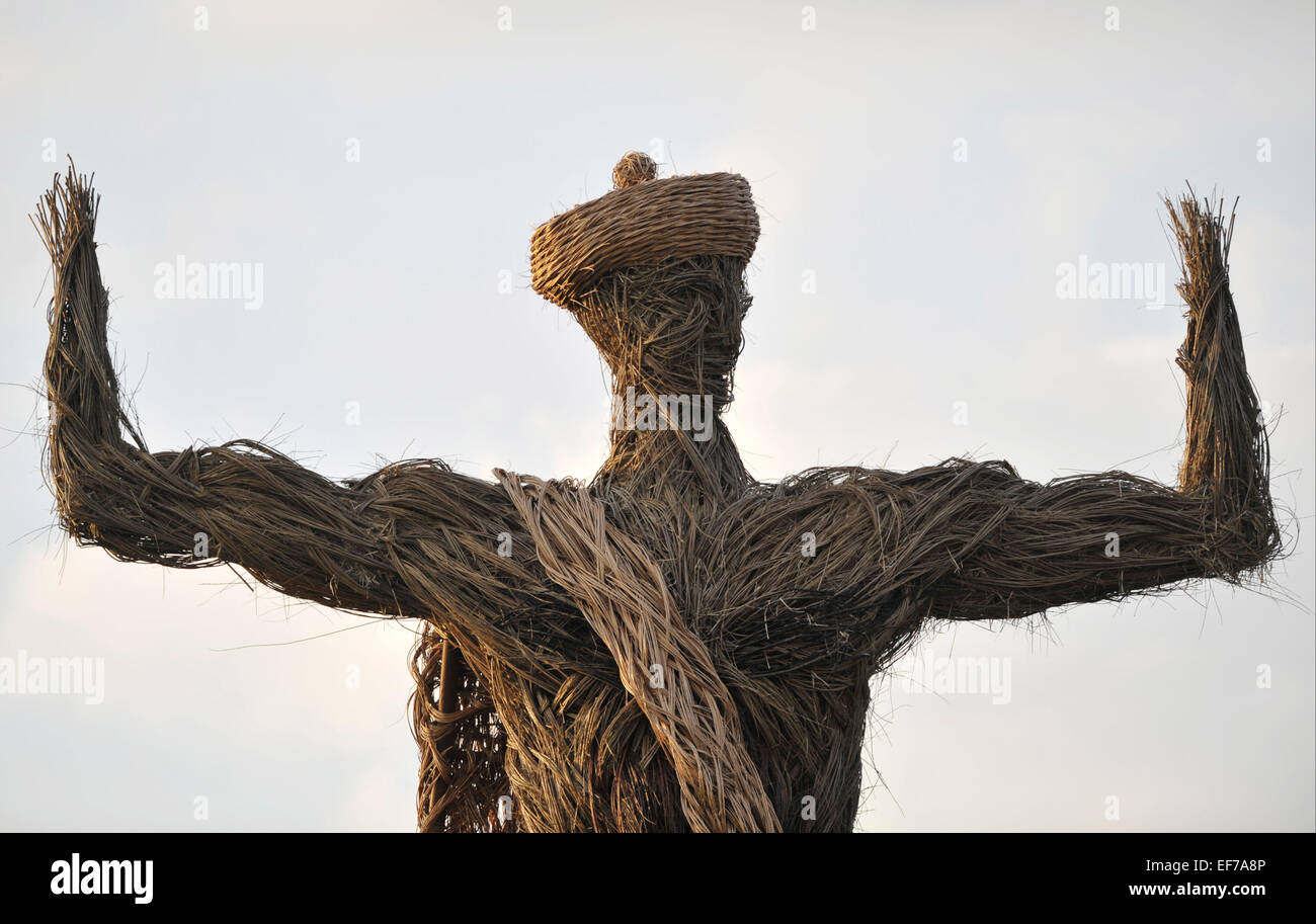 Music fans have a last look at the wicker man before it is burned at ...