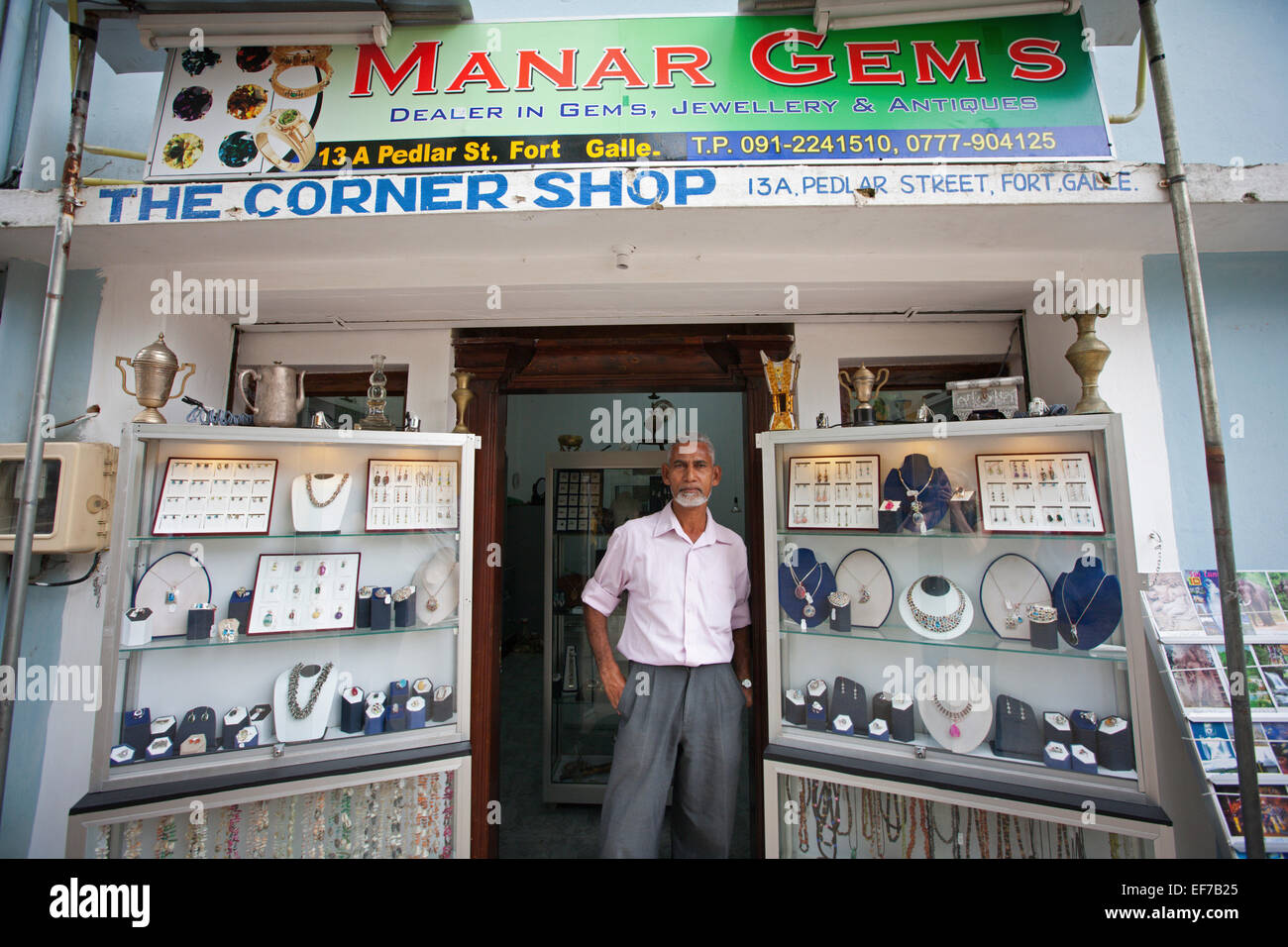 GEM STONE SELLER IN HIS SHOP DOORWAY Stock Photo - Alamy