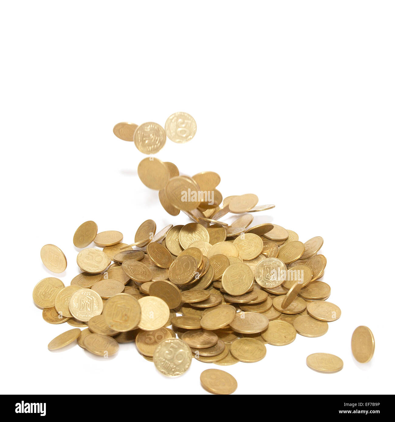 Rain of golden coins isolated on white Stock Photo - Alamy