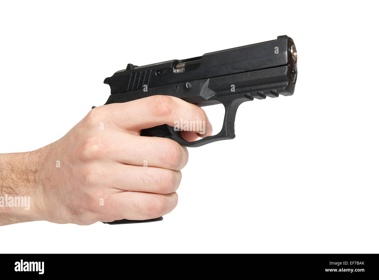Black gun in a hand isolated on white Stock Photo - Alamy