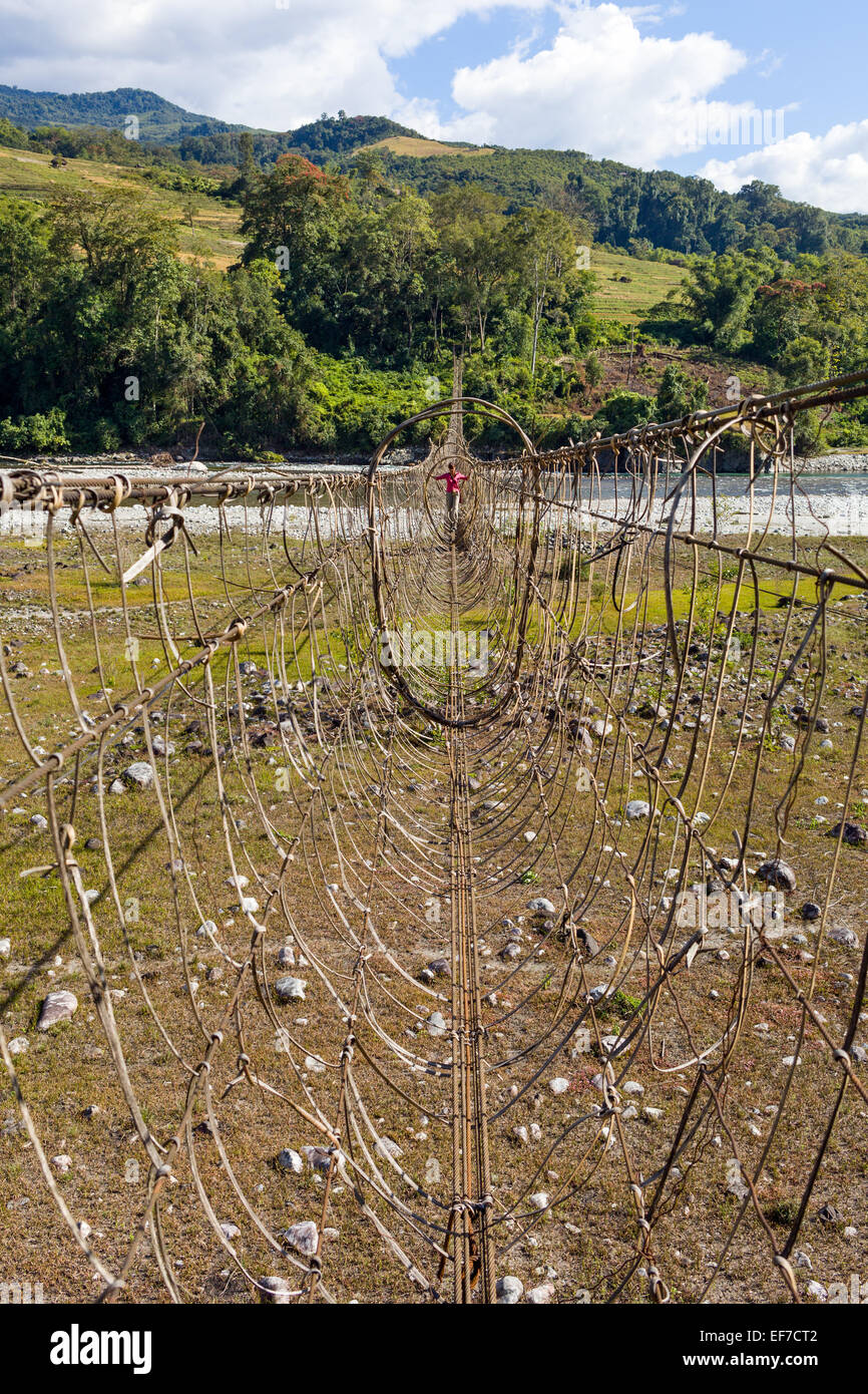 1000ft (300m) long suspension bridge over the siang rive Stock Photo ...
