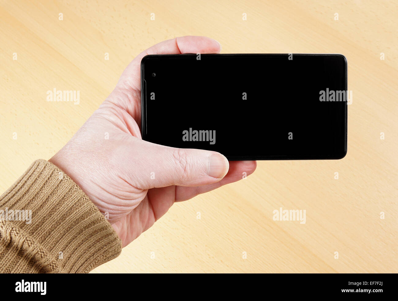 hand holding smart phone Stock Photo - Alamy