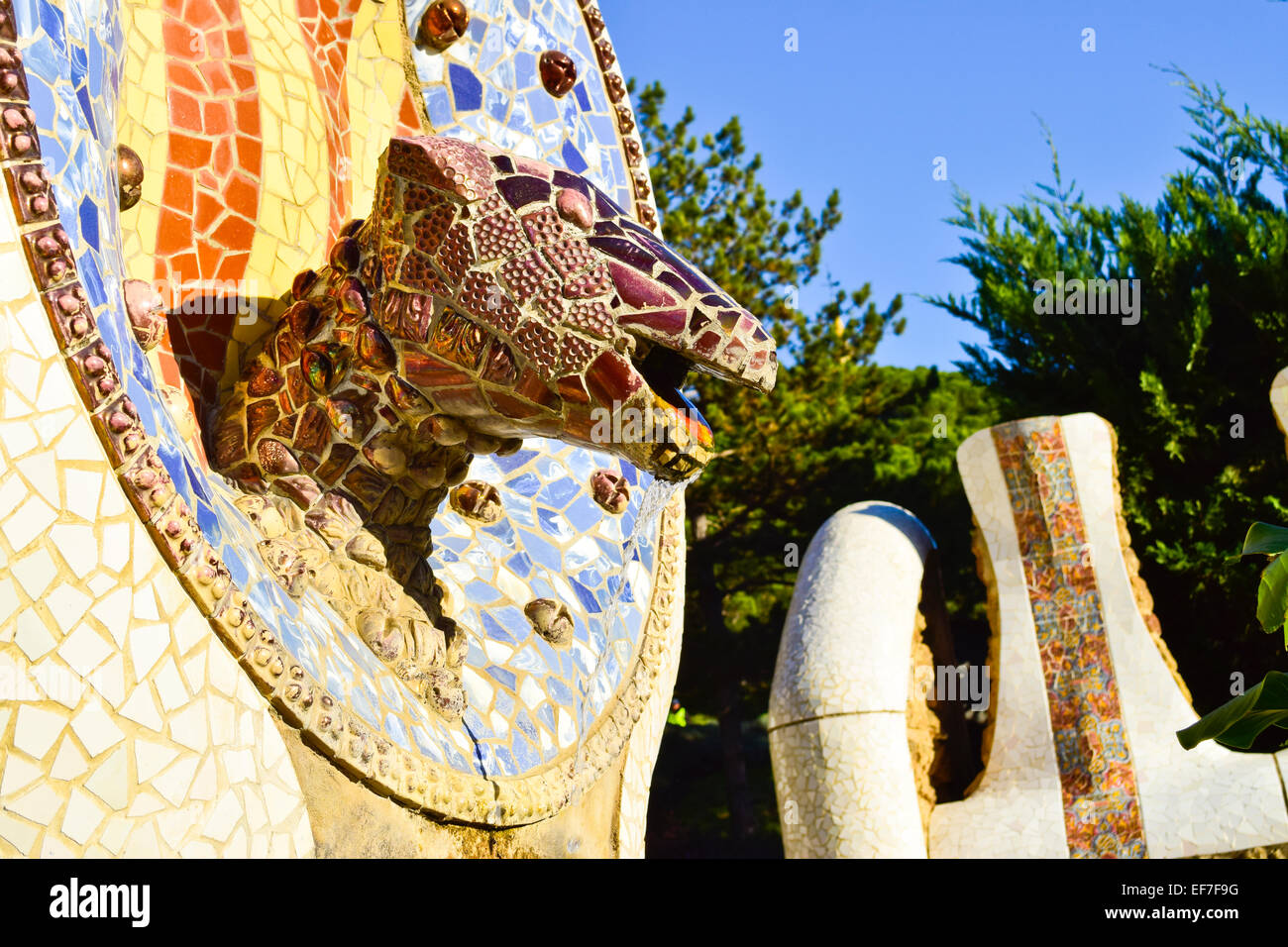Mosaic dragon's head water fountain. Park Guell designed by Antoni ...
